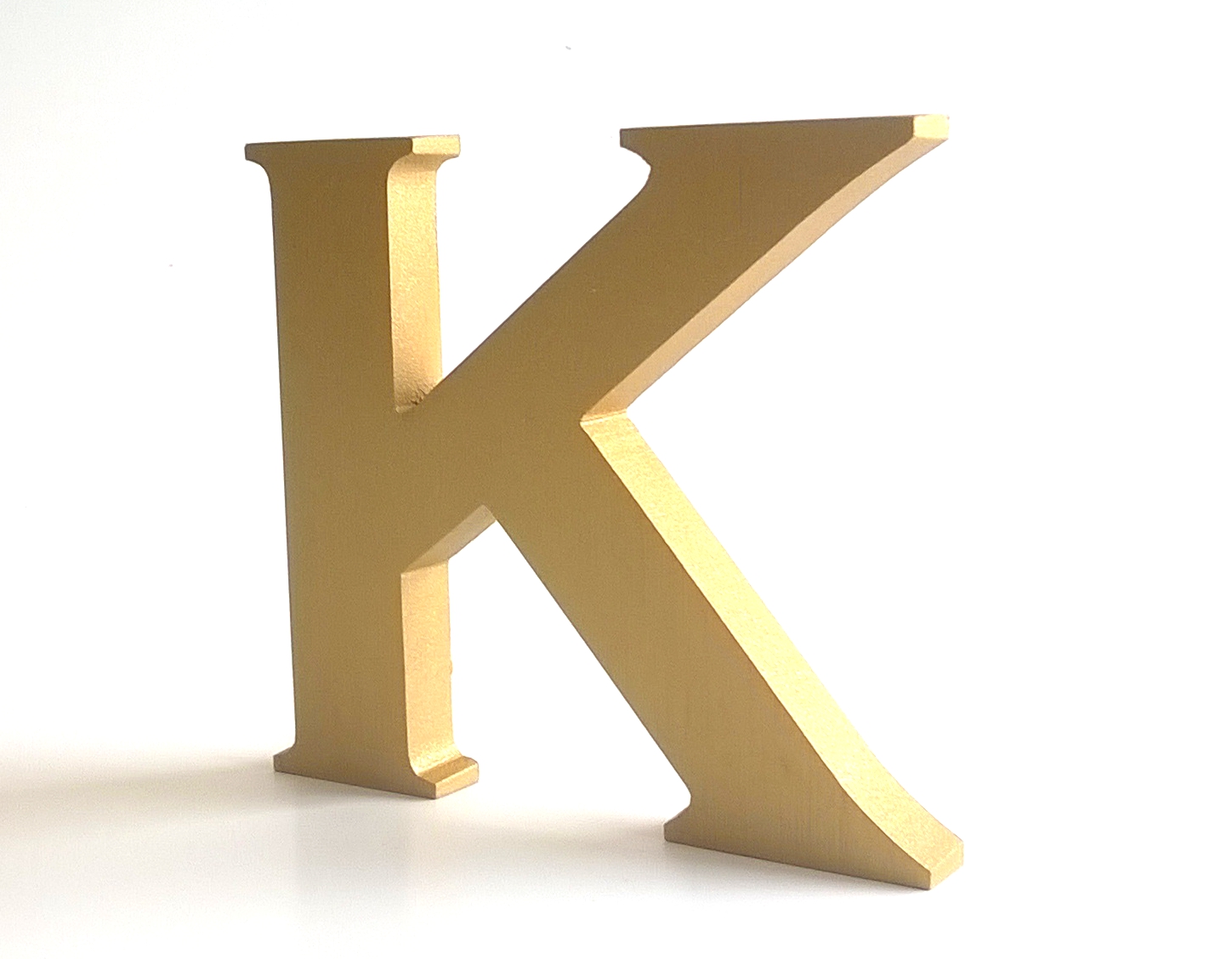 gold-anodized-cast-aluminium-letter-KKK | METAL LETTERS